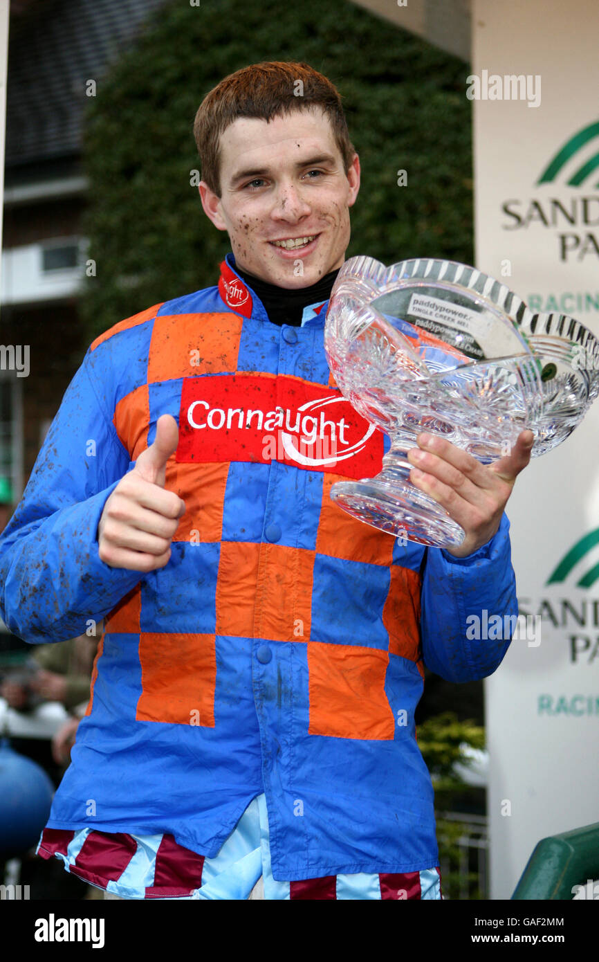 Sam Thomas is presented with a trophy after winning the paddypower.com ...