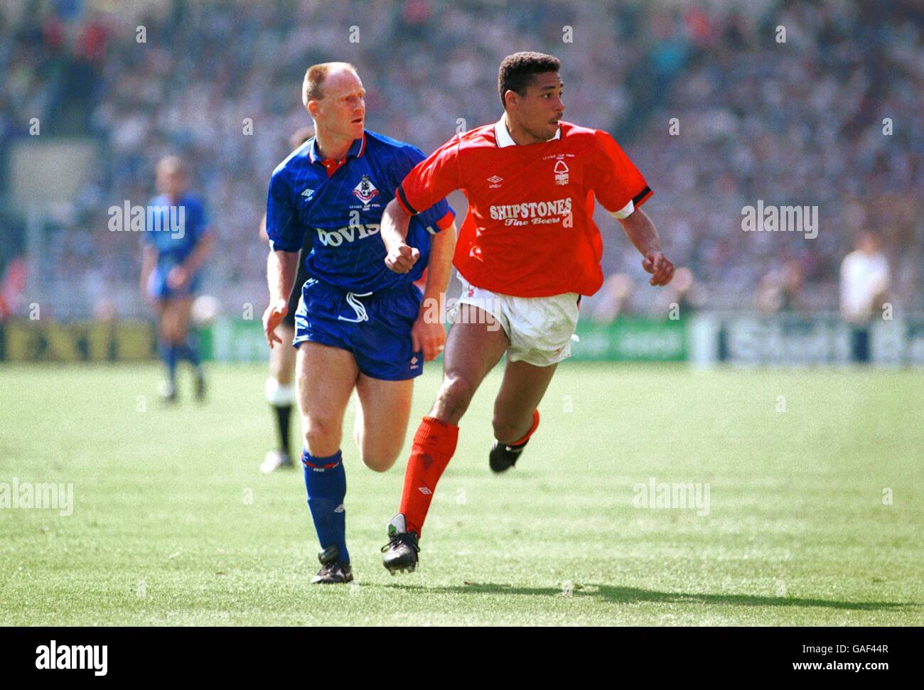 (L-R) Oldham Athletic's Andy Ritchie is closely marked by Nottingham ...