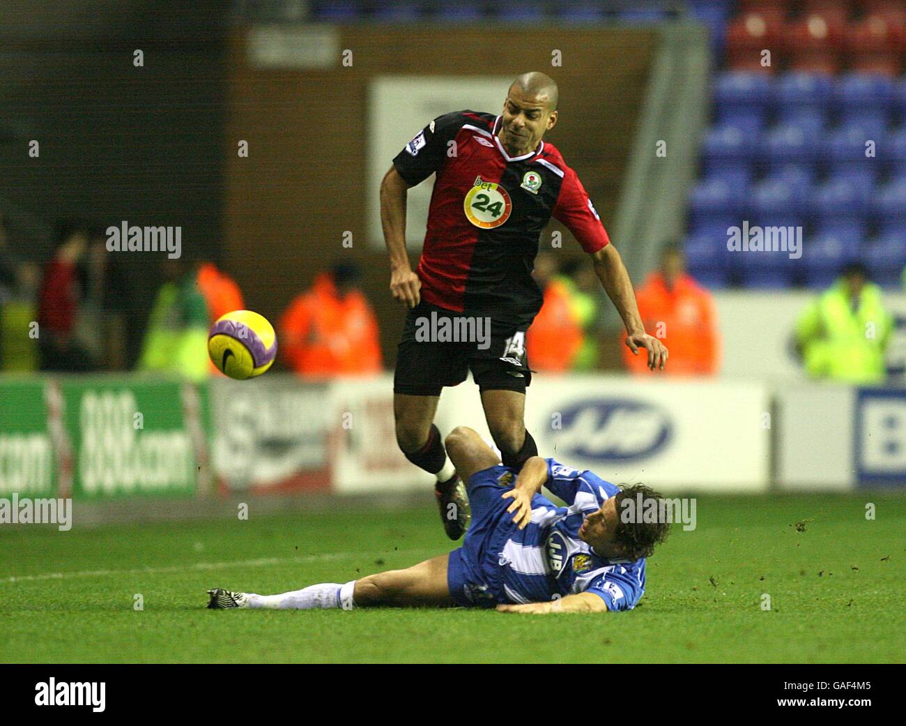 Wigan Athletic's Michael Brown and Blackburn Rovers' Steven Reid battle ...