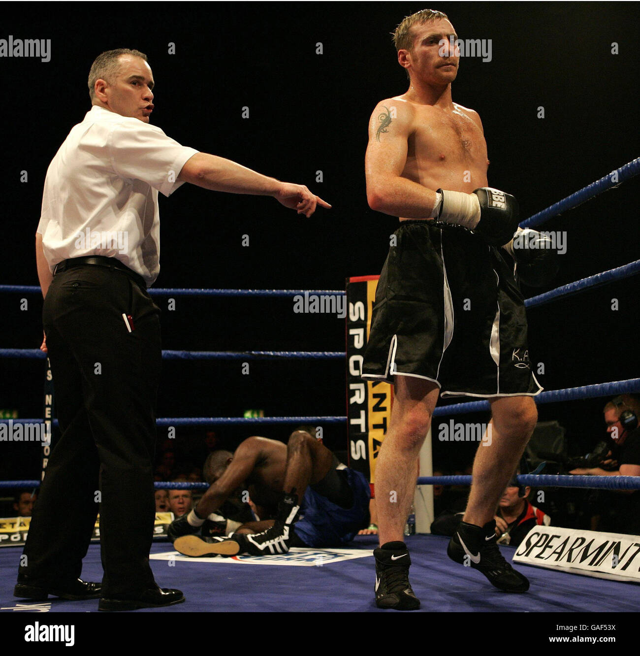 Scotland's Kenny Anderson after knocking down England's Simeon Cover ...