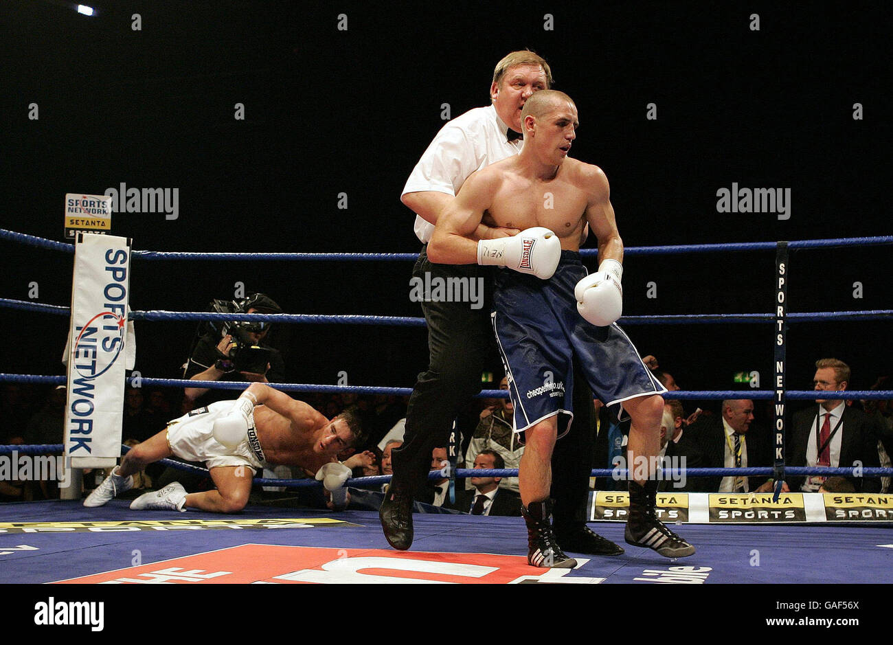 Scotland's Alex Arthur is knocked down in the eleventh round by England ...
