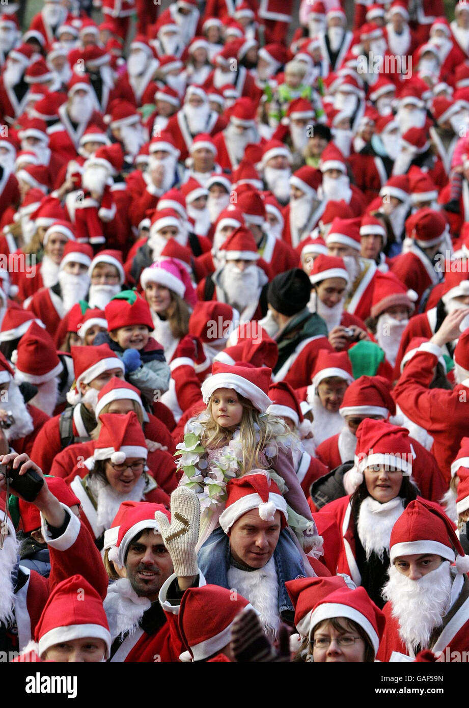 Thousands of people, dressed up as Santa, take part in The Great ...