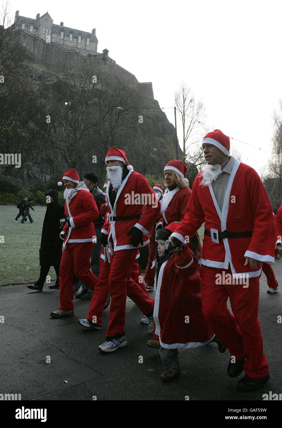 Thousands of people, dressed up as Santa, take part in the Great ...