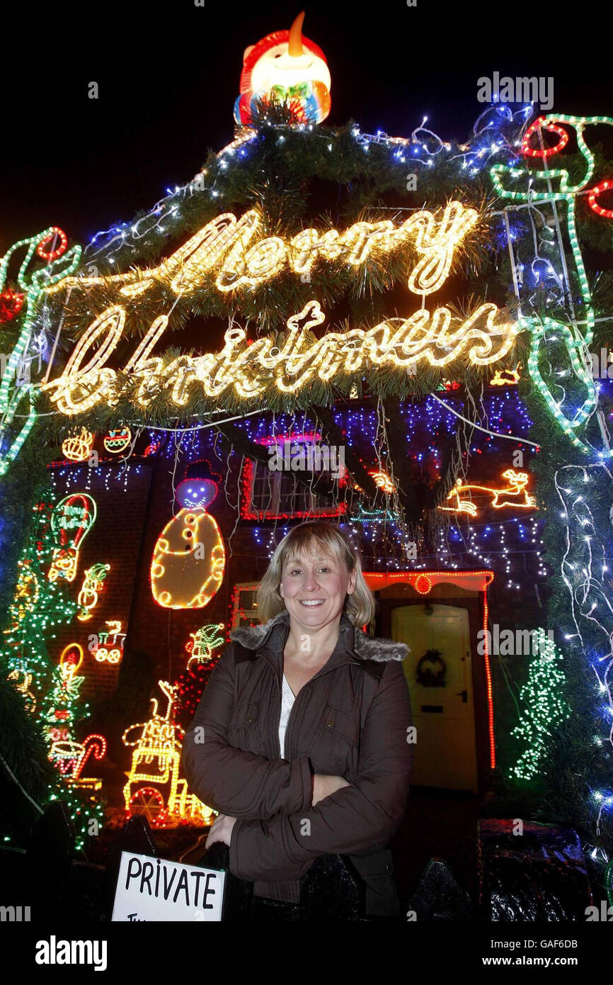 Jo Gill stands outside her house in Reddish, Stockport, on Tuesday ...
