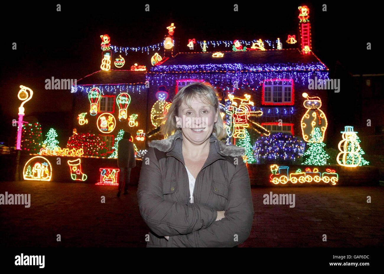 Jo Gill stands outside her house in Reddish, Stockport, on Tuesday ...