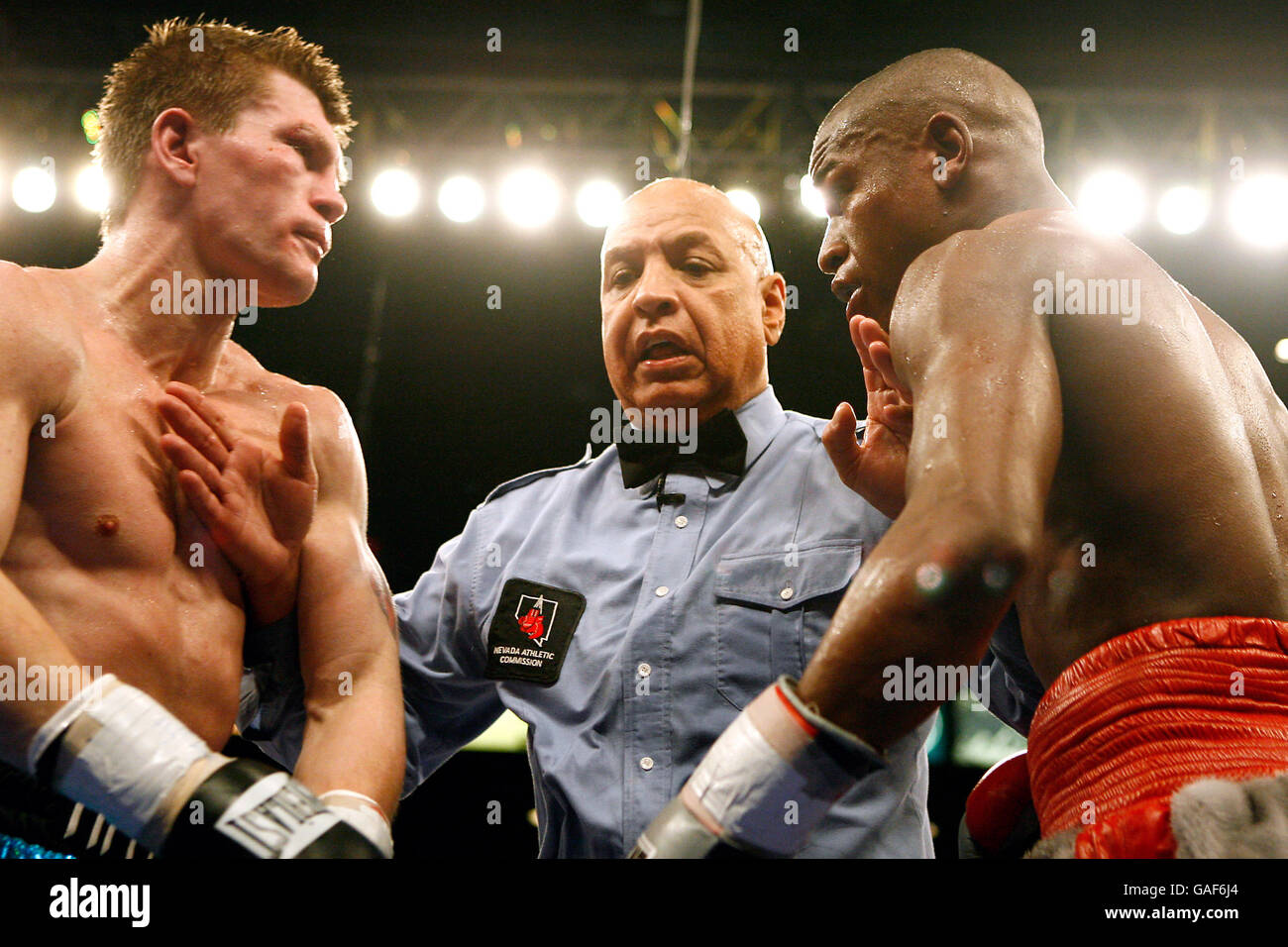 Referee Joe Cortez comes between USA's Floyd Mayweather and England's ...