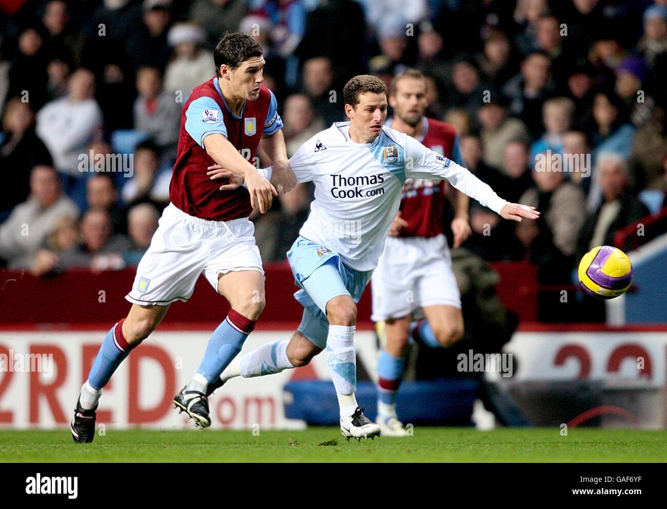 Manchester City's Blumer Elano and Aston Villa's Gareth Barry (left ...