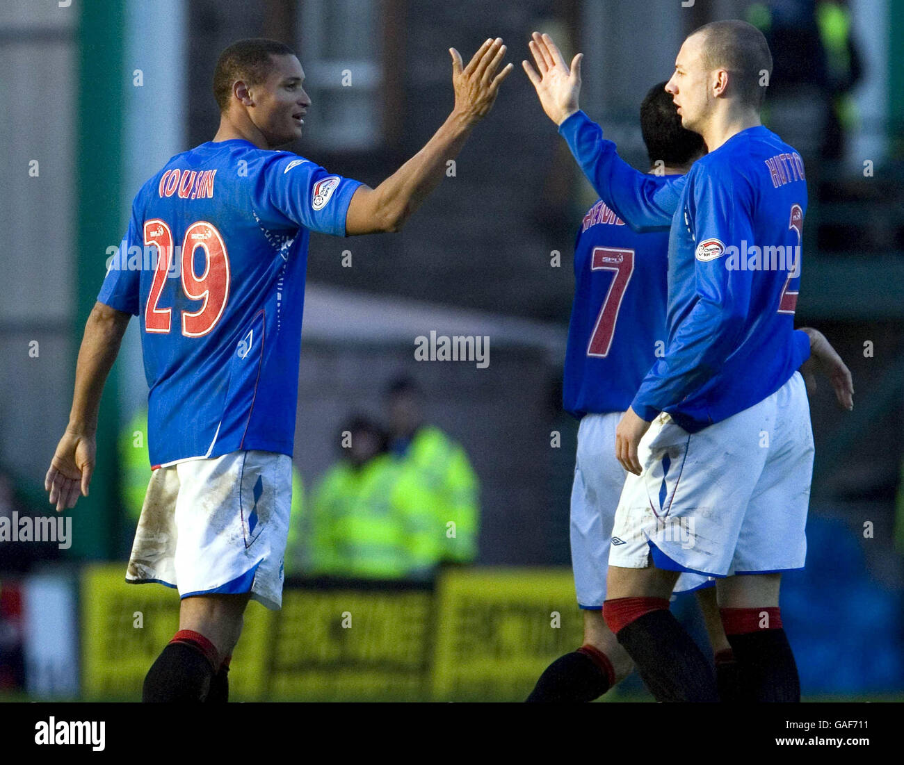 Rangers' Daniel Cousin (left) celebrates scoring during the Clydesdale ...
