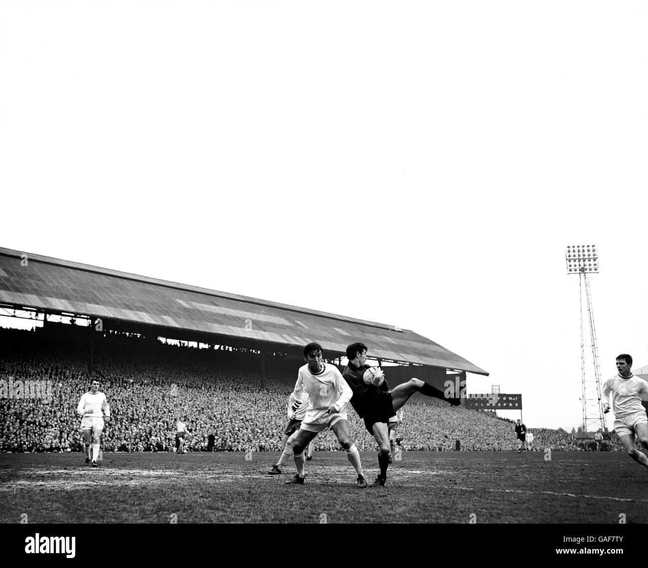 Chelsea goalkeeper Peter Bonetti (r) saves under pressure from ...