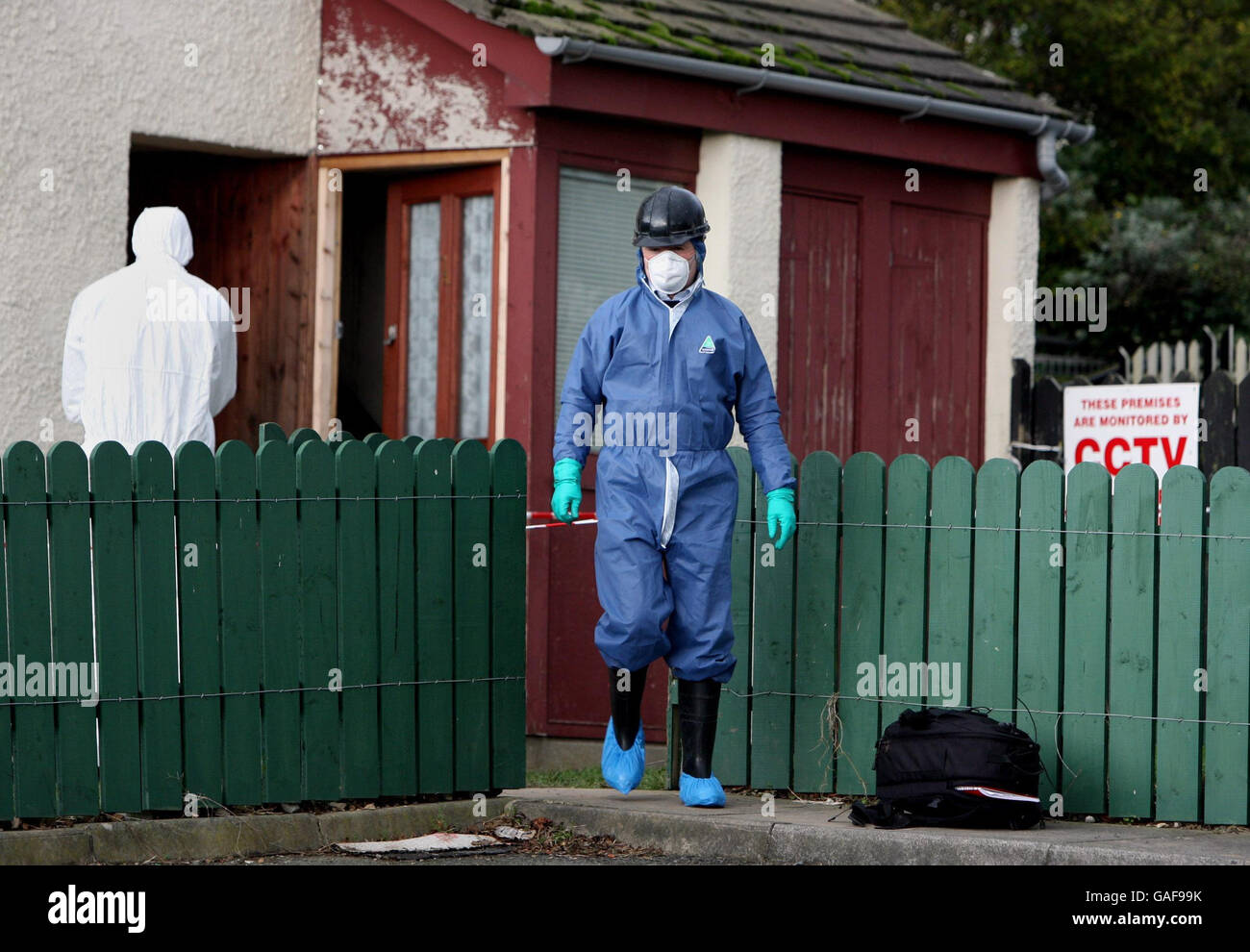 Police Forensic experts at a flat in Downpatrick Co Down following a ...