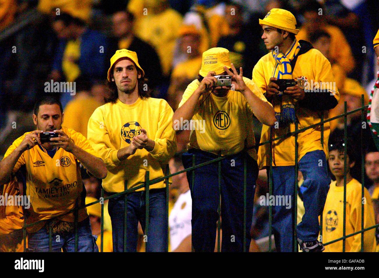 AEL Limassol fans keep a close eye on the action during the game ...