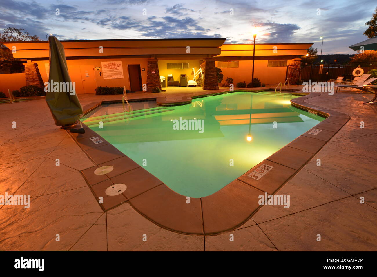 A swimming pool at a Hotel in America at first light Stock Photo - Alamy