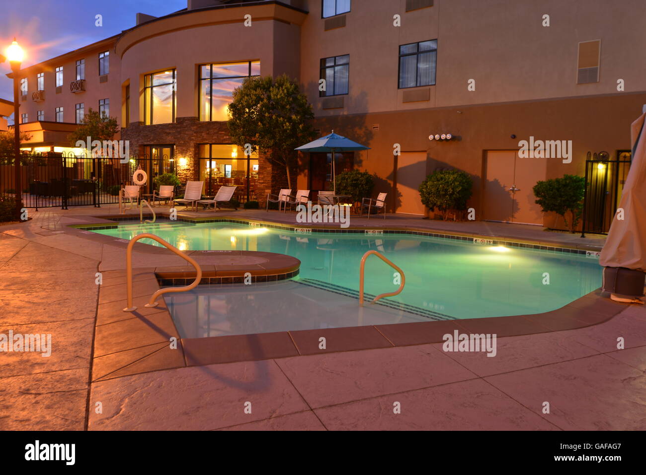 A swimming pool at a Hotel in America at first light Stock Photo - Alamy