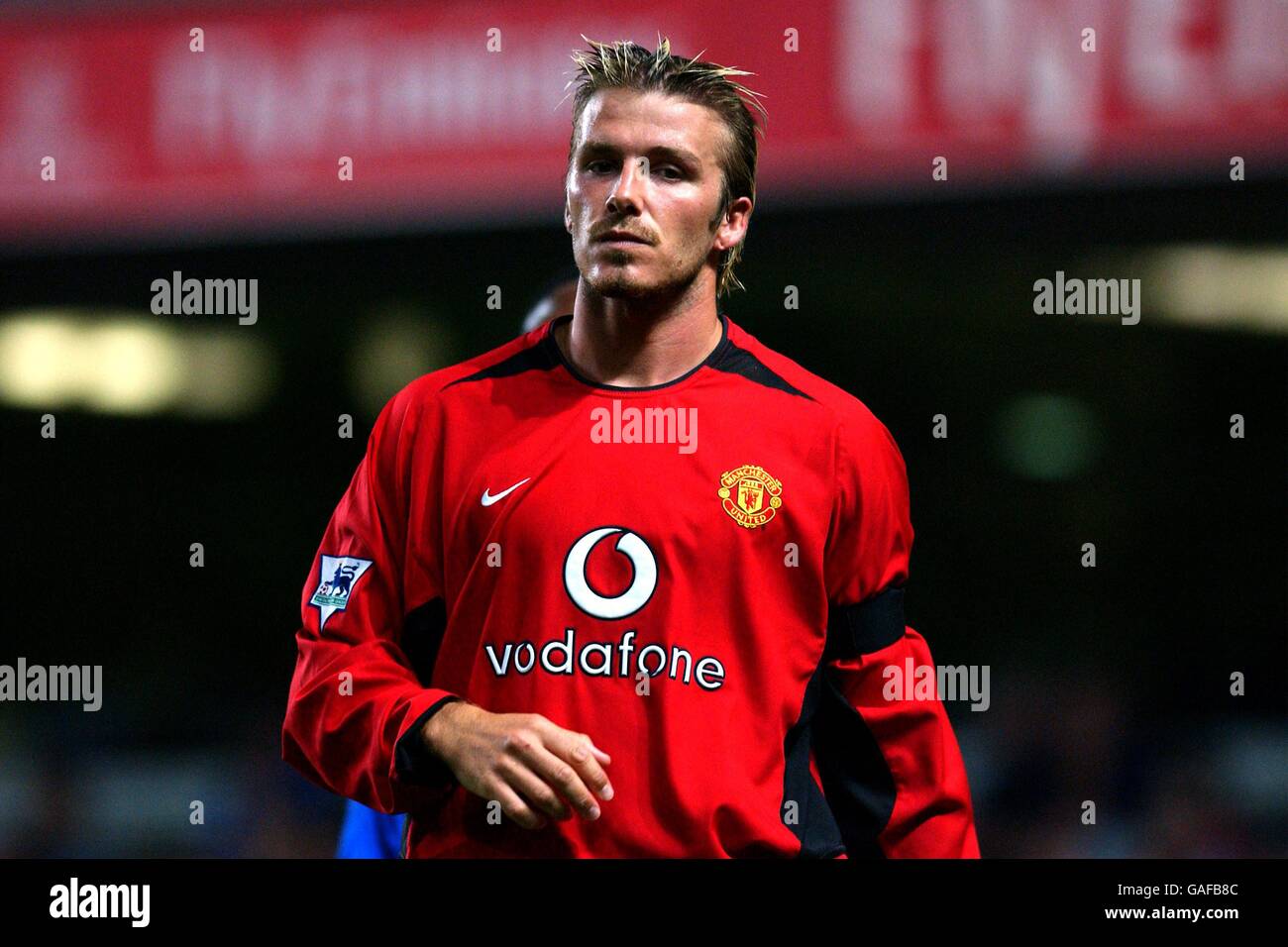 Manchester United's David Beckham wears a black arm band out as a mark ...