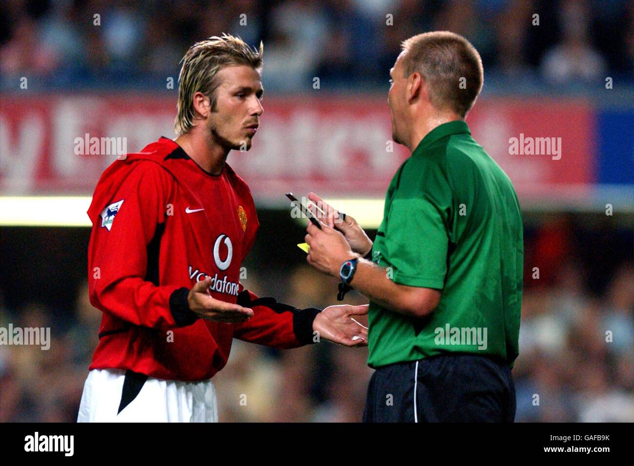 Manchester United's David Beckham shows his frusteration at referee ...