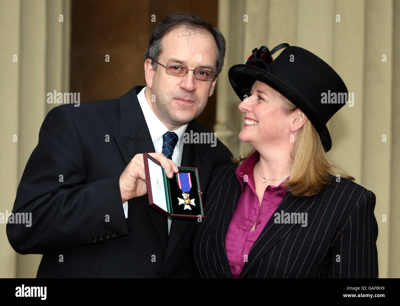 e Laura Kerr as he collects his Royal Victorian Order Stock Photo - Alamy