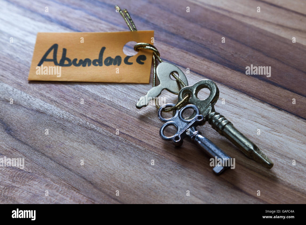 concept for a happy abundant life using old decorative keys and a hand ...