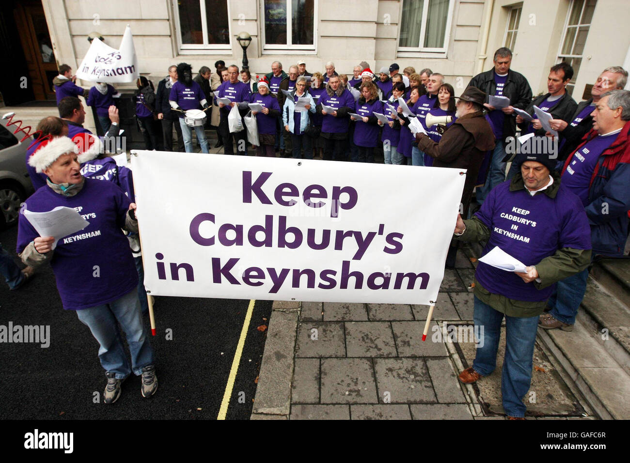 Workers from Cadbury's factory in Keynsham, near Bristol sing altered ...