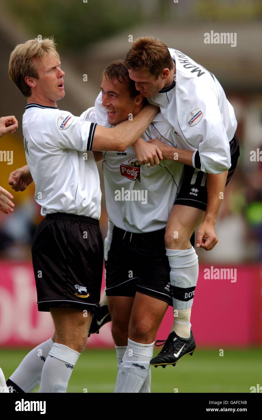 Derby Country's Branko Strupar (c) celebrates scoring with teammates ...