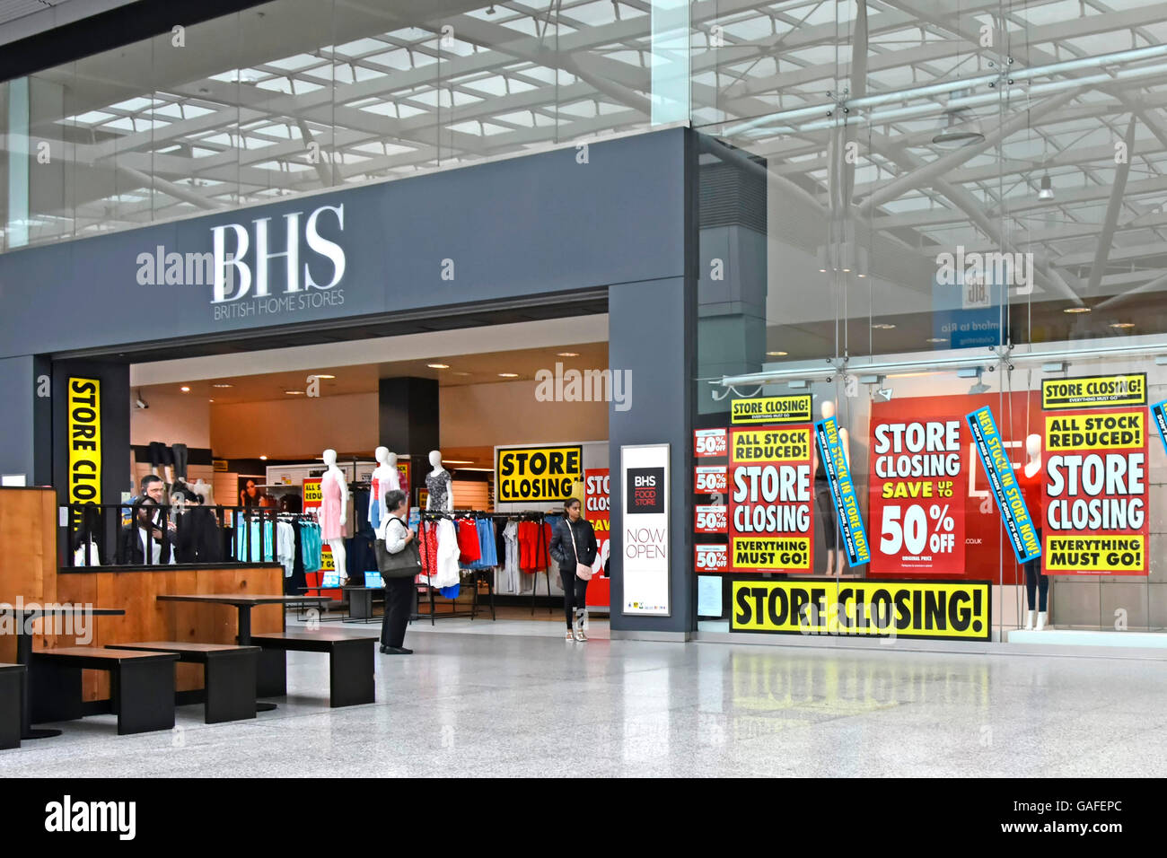 England UK BHS store shop front in indoor shopping mall holding closing ...