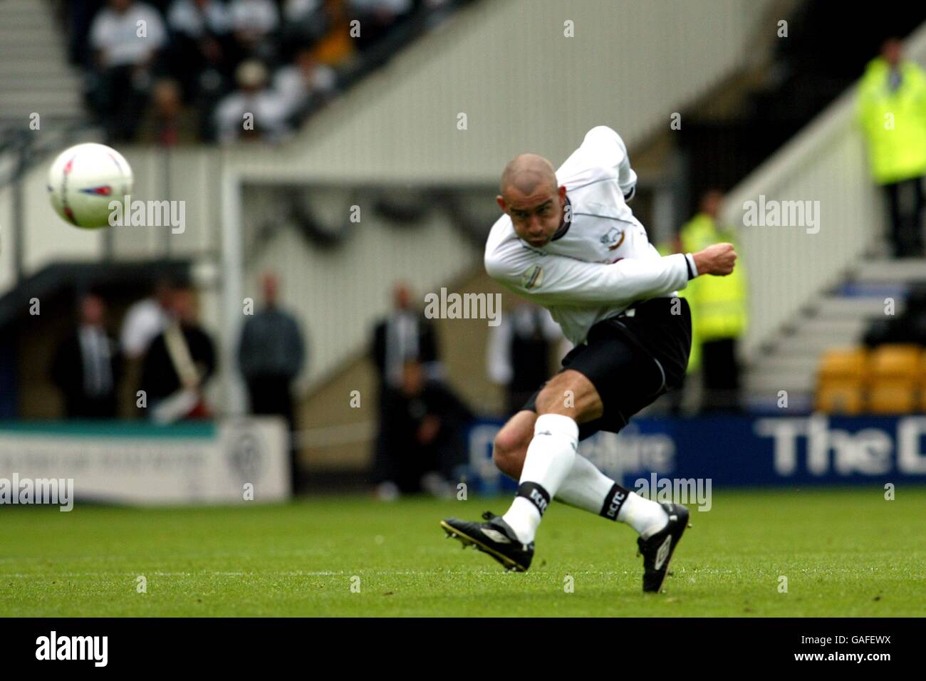 Derby countys danny higginbotham takes a shot at goal hi-res stock ...