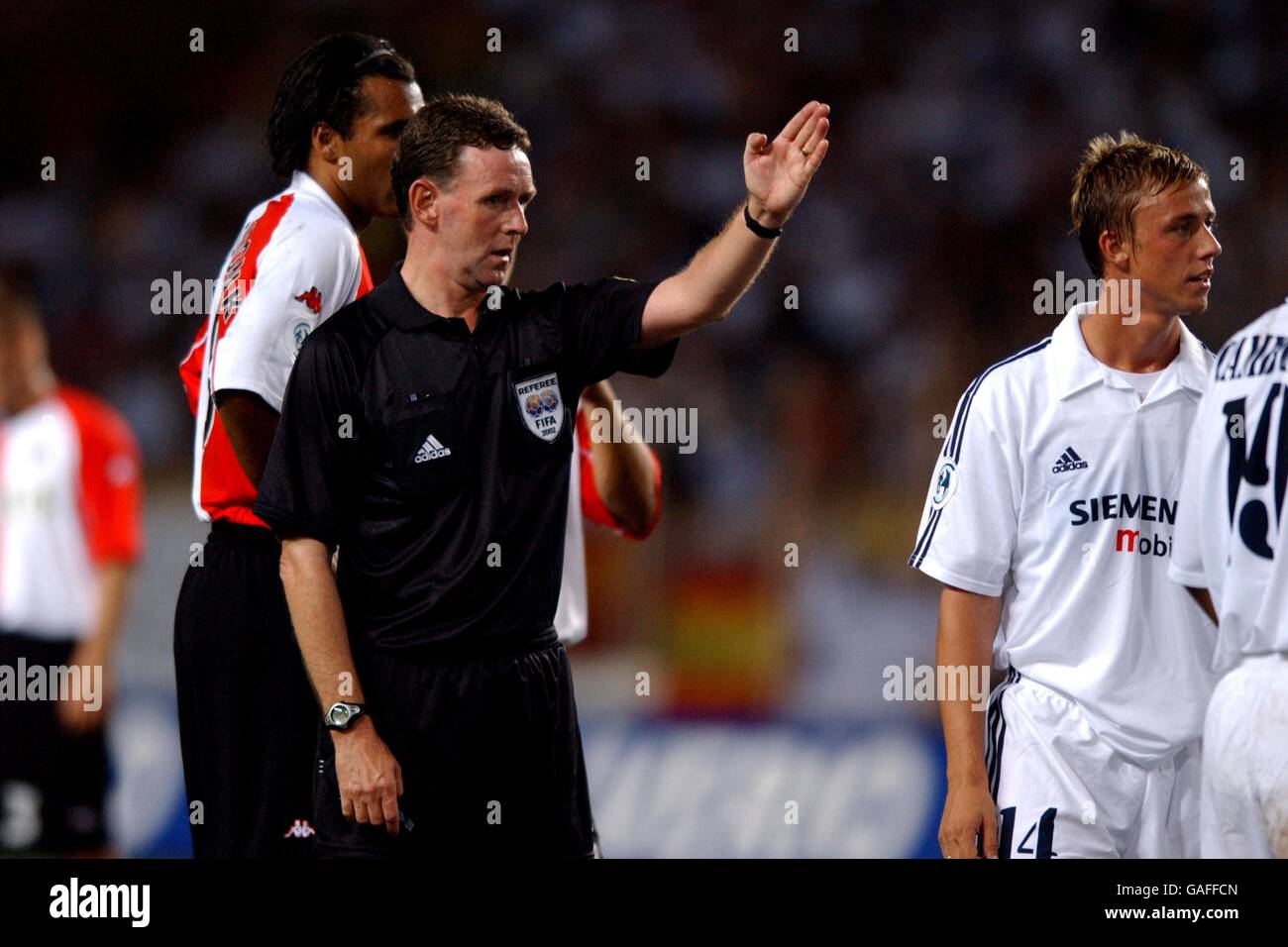 Referee hugh dallas signals a freekick hi-res stock photography and ...