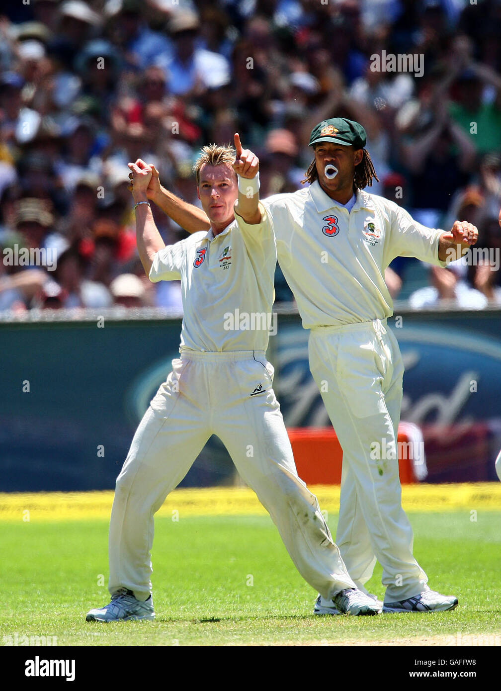 Australia's Brett Lee celebrates with Andrew Symonds after claiming the ...