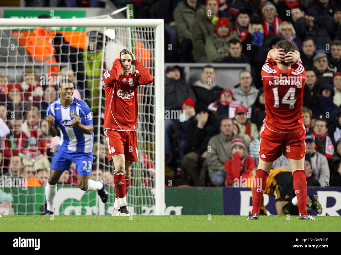 Wigan Athletic's Marcus Bent (left) celebrates team mate Titus Bramble ...