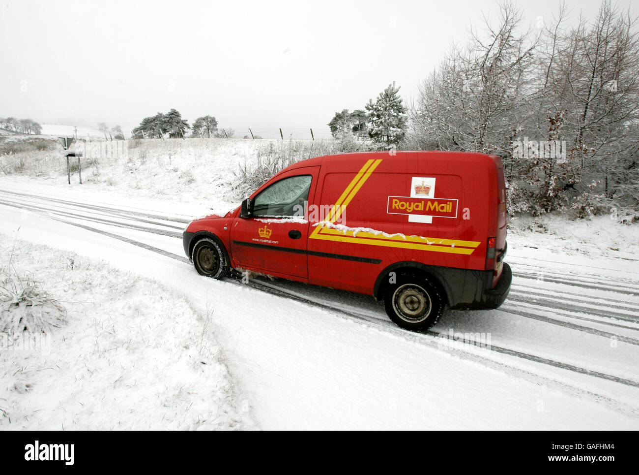 A Royal Mail post van struggles through the snow near Carron Valley in ...