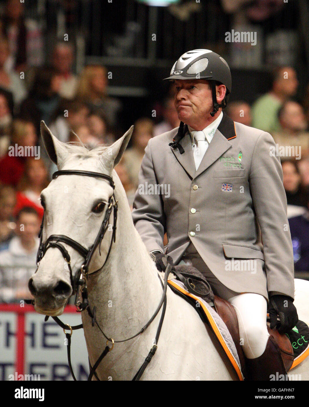 Britain's Tim Stockdale riding Fresh Direct Corlato in the Olympia ...