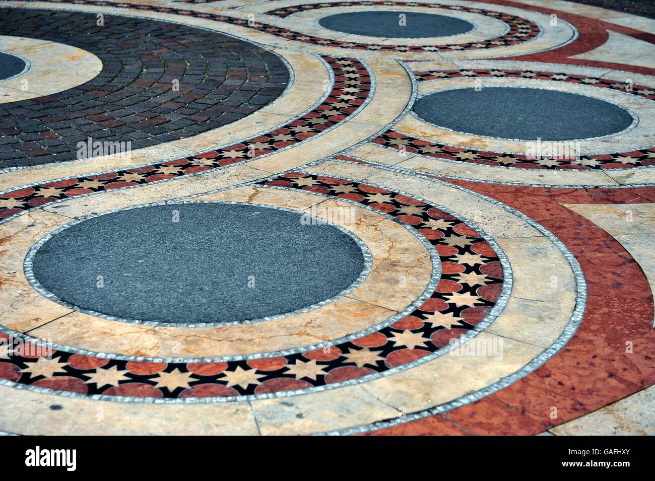 Round tiles in the street of Budapest Stock Photo - Alamy