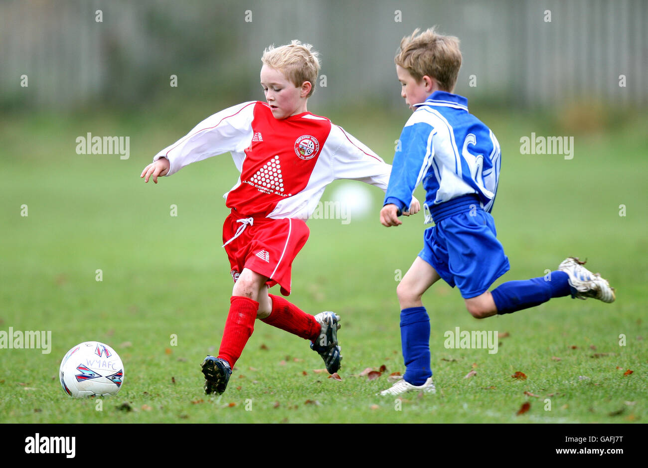 Soccer - Children playing football Stock Photo - Alamy