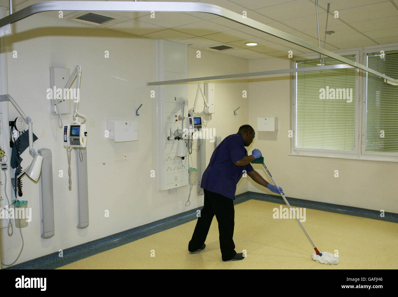 Members domestic floor team deep clean a ward hi-res stock photography ...