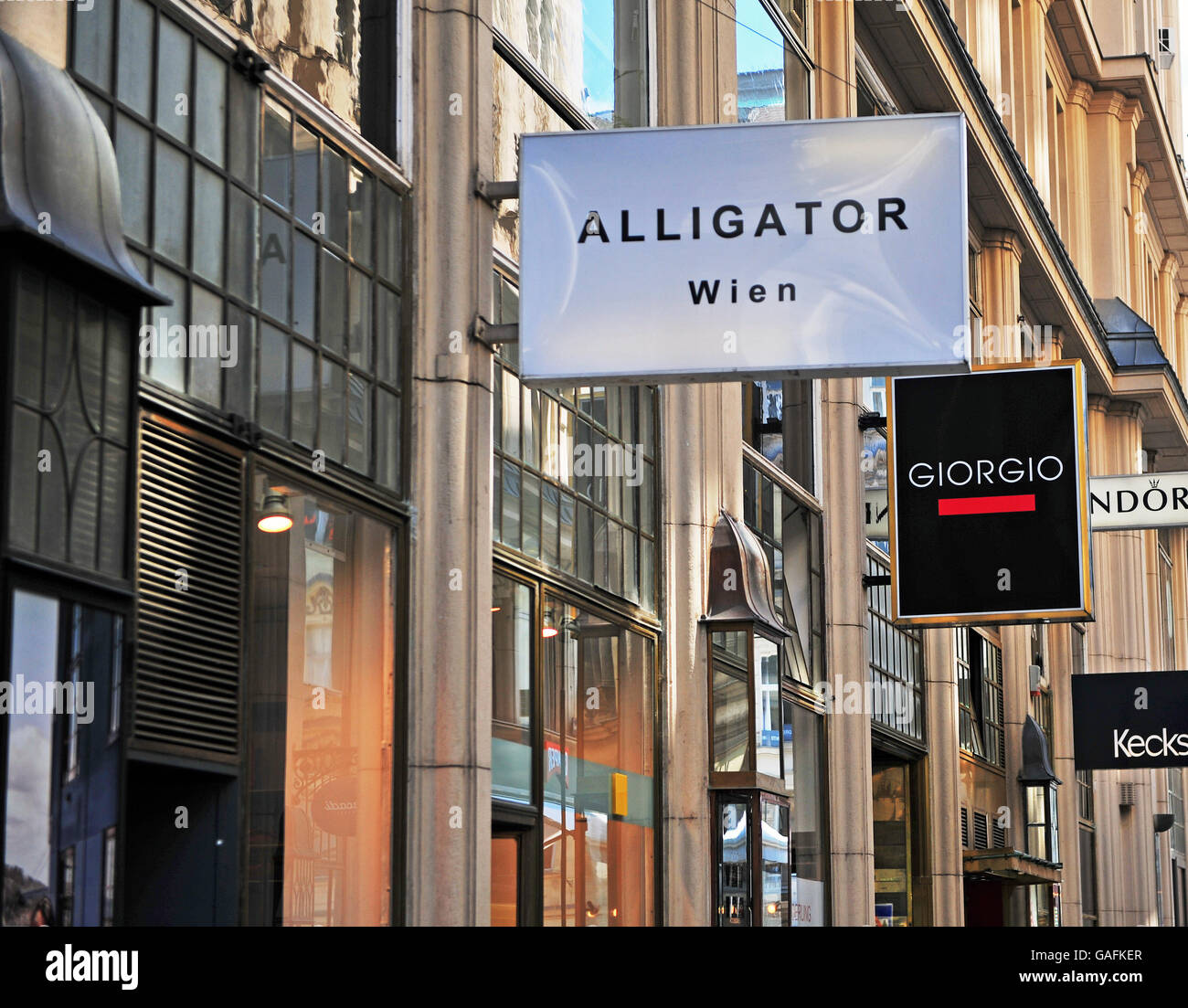 VIENNA, AUSTRIA - JUNE 6: View of the shopping street with shop labels ...