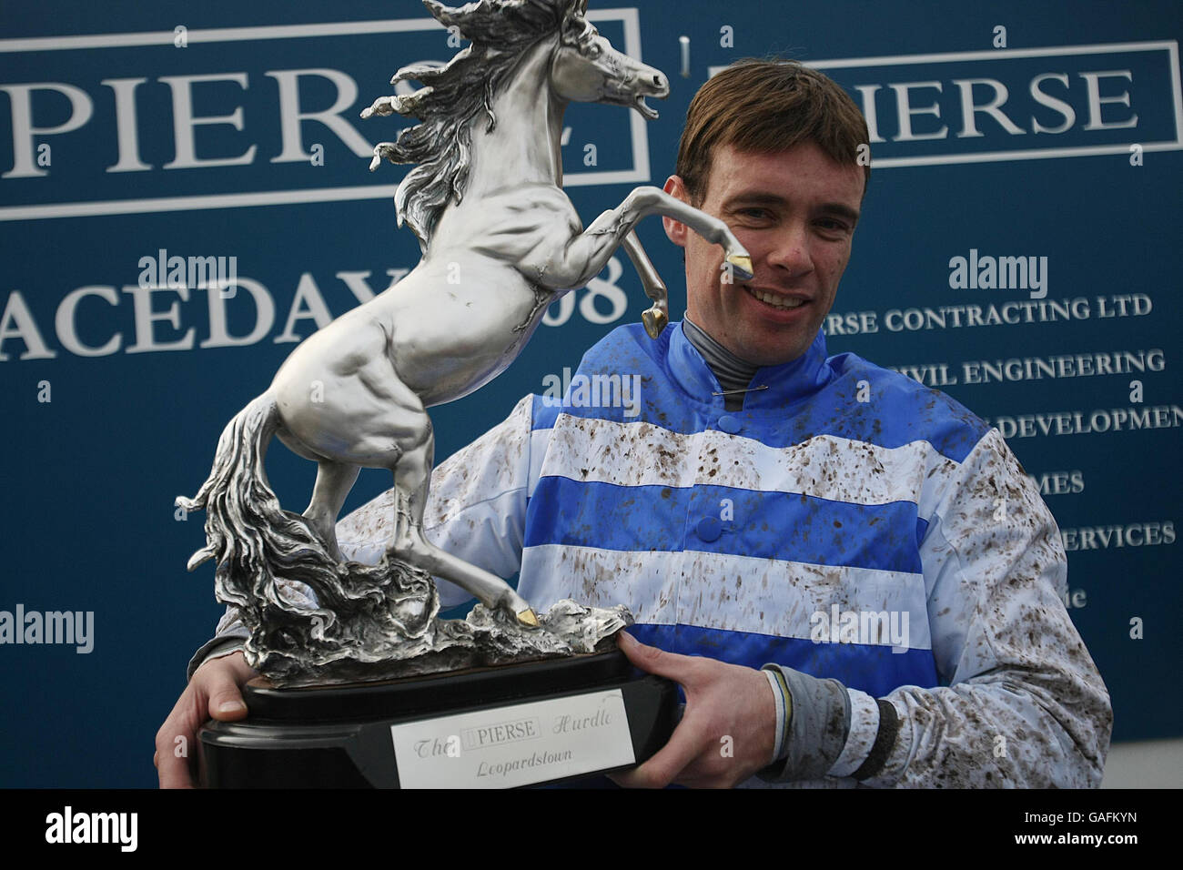 Timmy Murphy celebrates with the trophy after claiming victory on ...
