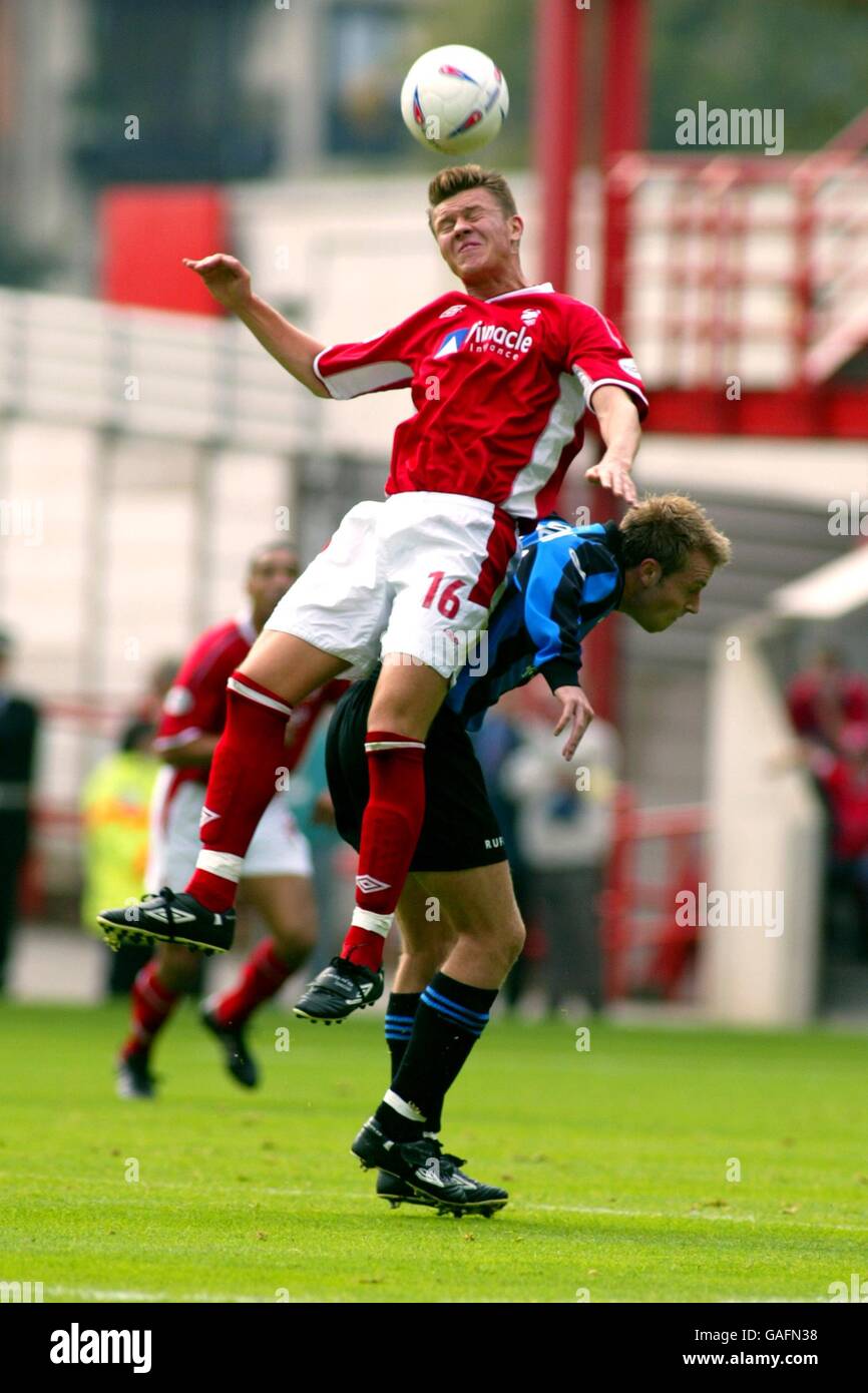 Nottingham Forest's Eugen Bopp rises above Rotherham United's Chris ...