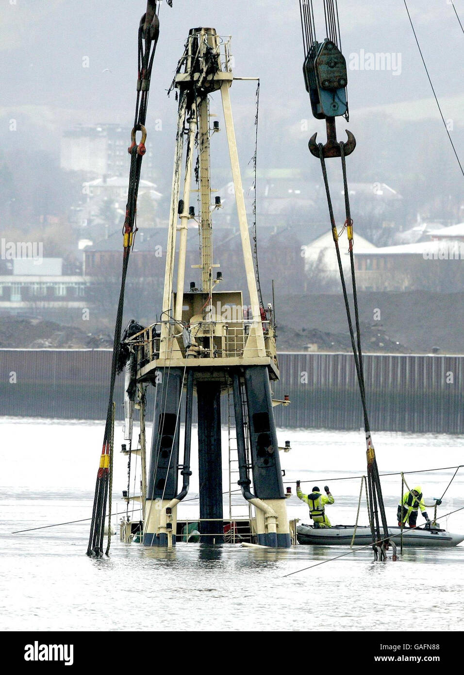 The top of the Flying Phantom tug is visible, as the barge GPS Atlas ...