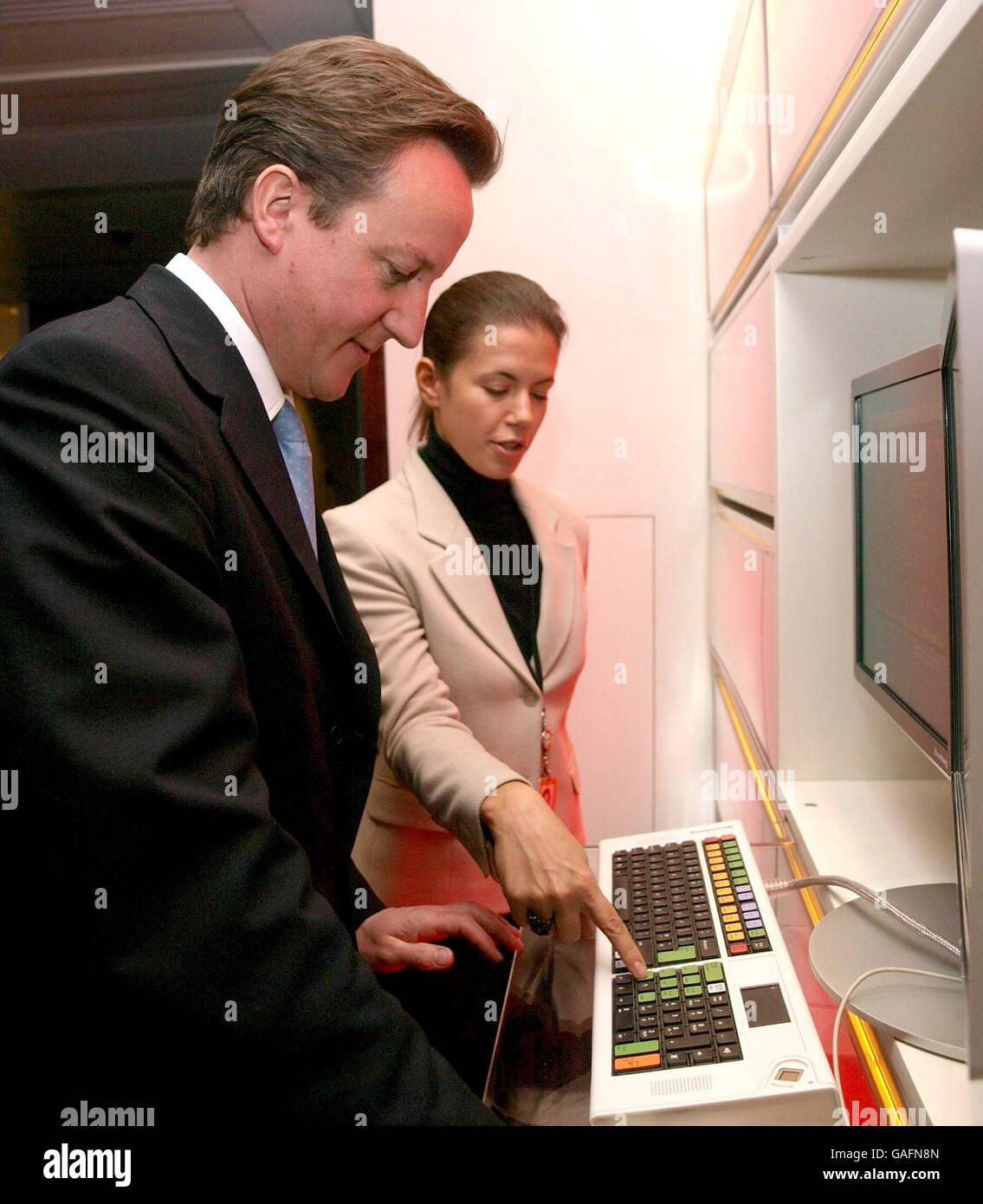 Bloomberg employee Florence Quirici shows the Conservative party leader ...