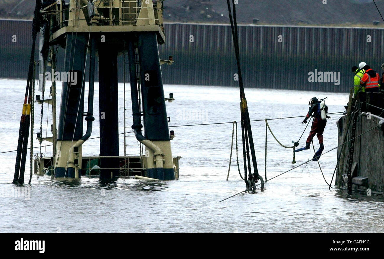 Salvage operation continues on tug Stock Photo - Alamy