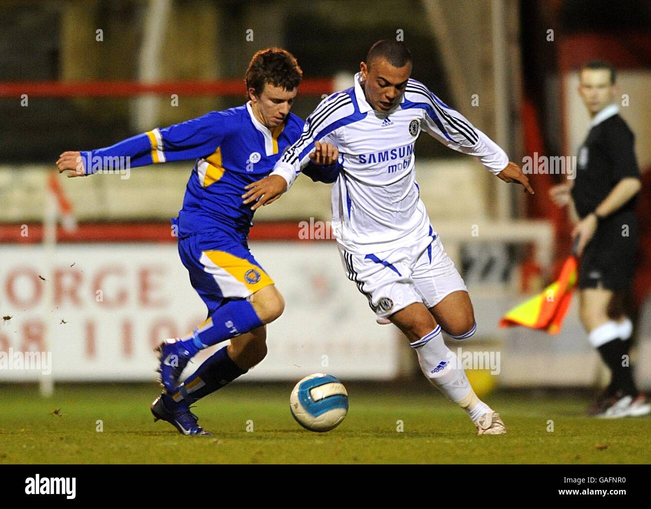 Chelsea's Benjamin Gordon (r) and Shrewsbury Town's Steve Daley battle ...