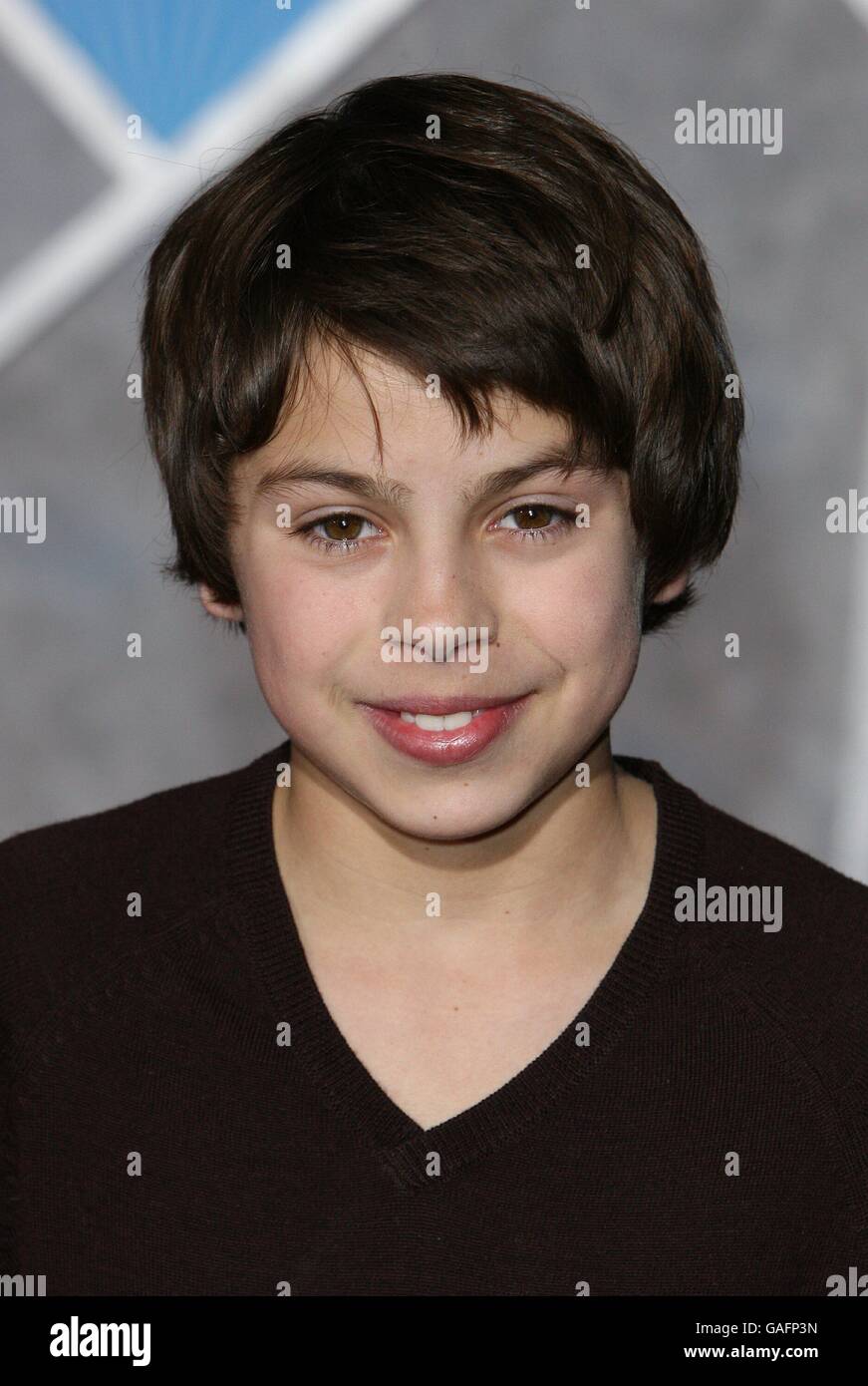 Jake Austin arrives at the premiere for new film Hannah Montana and ...