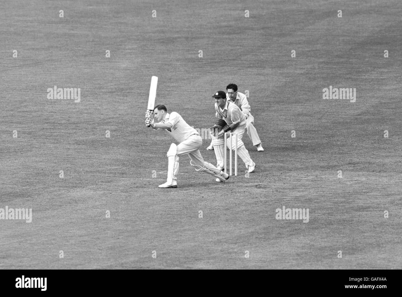 Surreys peter may l drives off the front foot hi-res stock photography ...