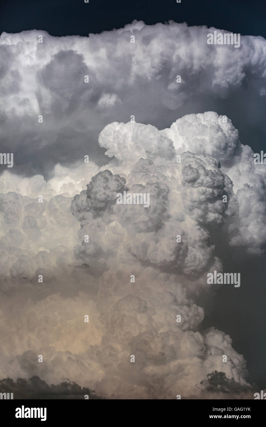 Cloudscape with very big cumulonimbus clouds shot with a long tele ...