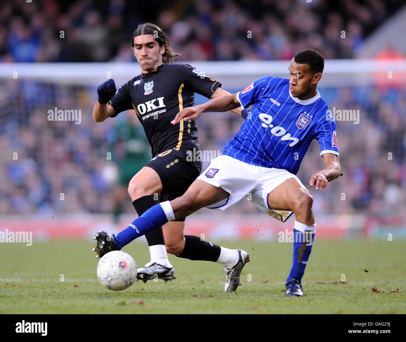 Ipswich towns danny hynes and portsmouths pedro mendes hi-res stock ...