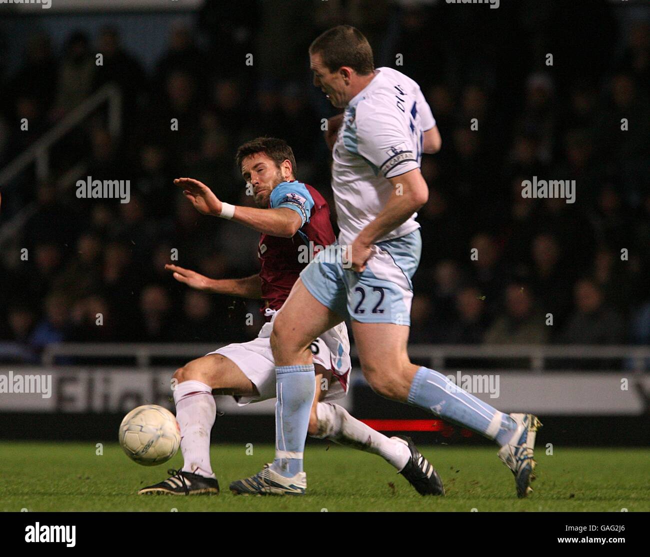 West Ham United's Matthew Upson and Manchester City's Richard Dunne ...