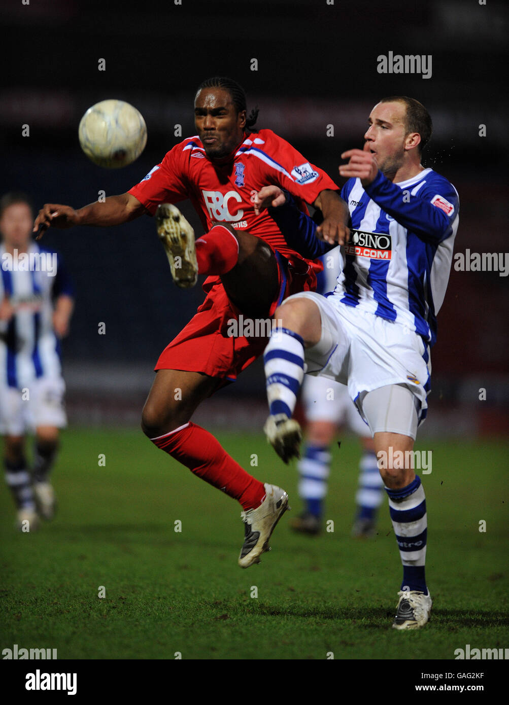 Huddersfield Town's David Mirfin and Birmingham City's Cameron Jerome ...