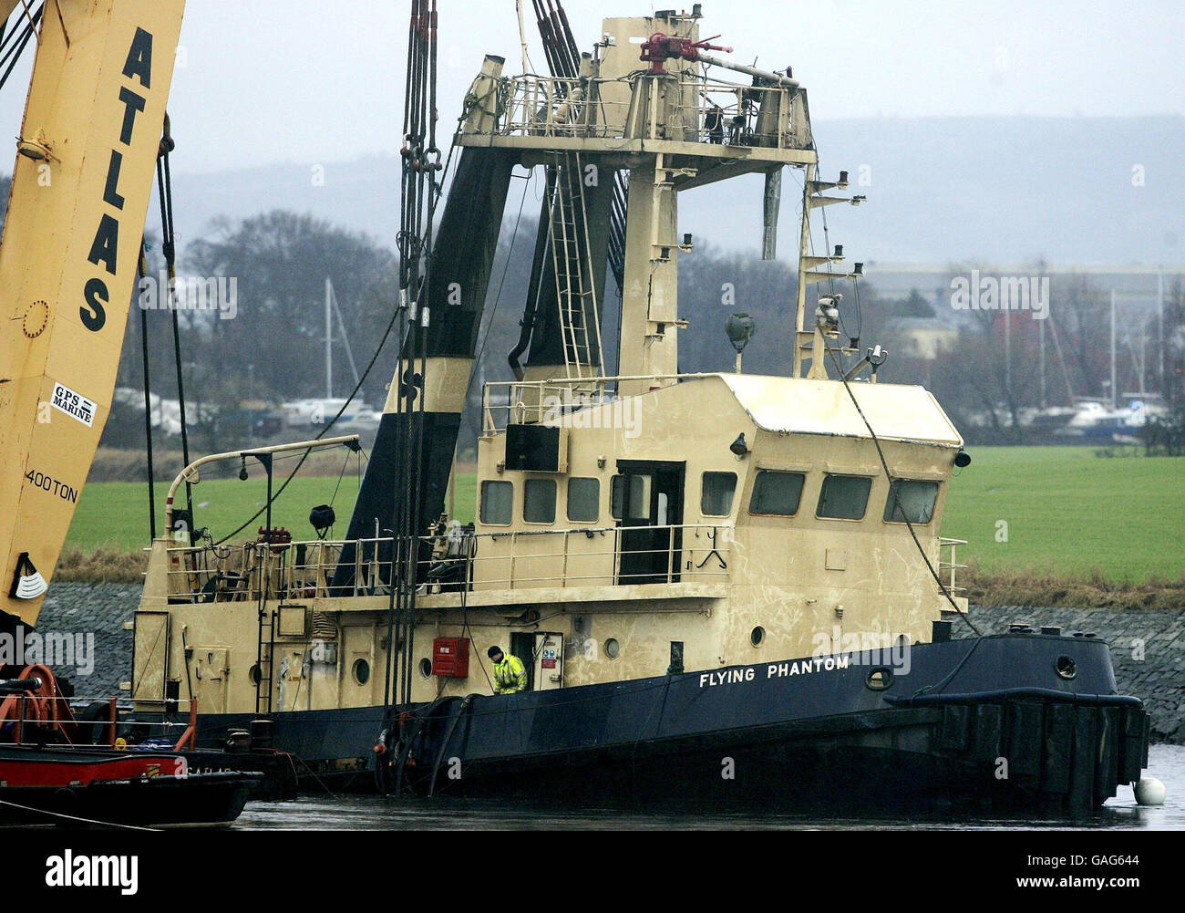 The Flying Phantom tug is visible as the barge, GPS Atlas, continues ...