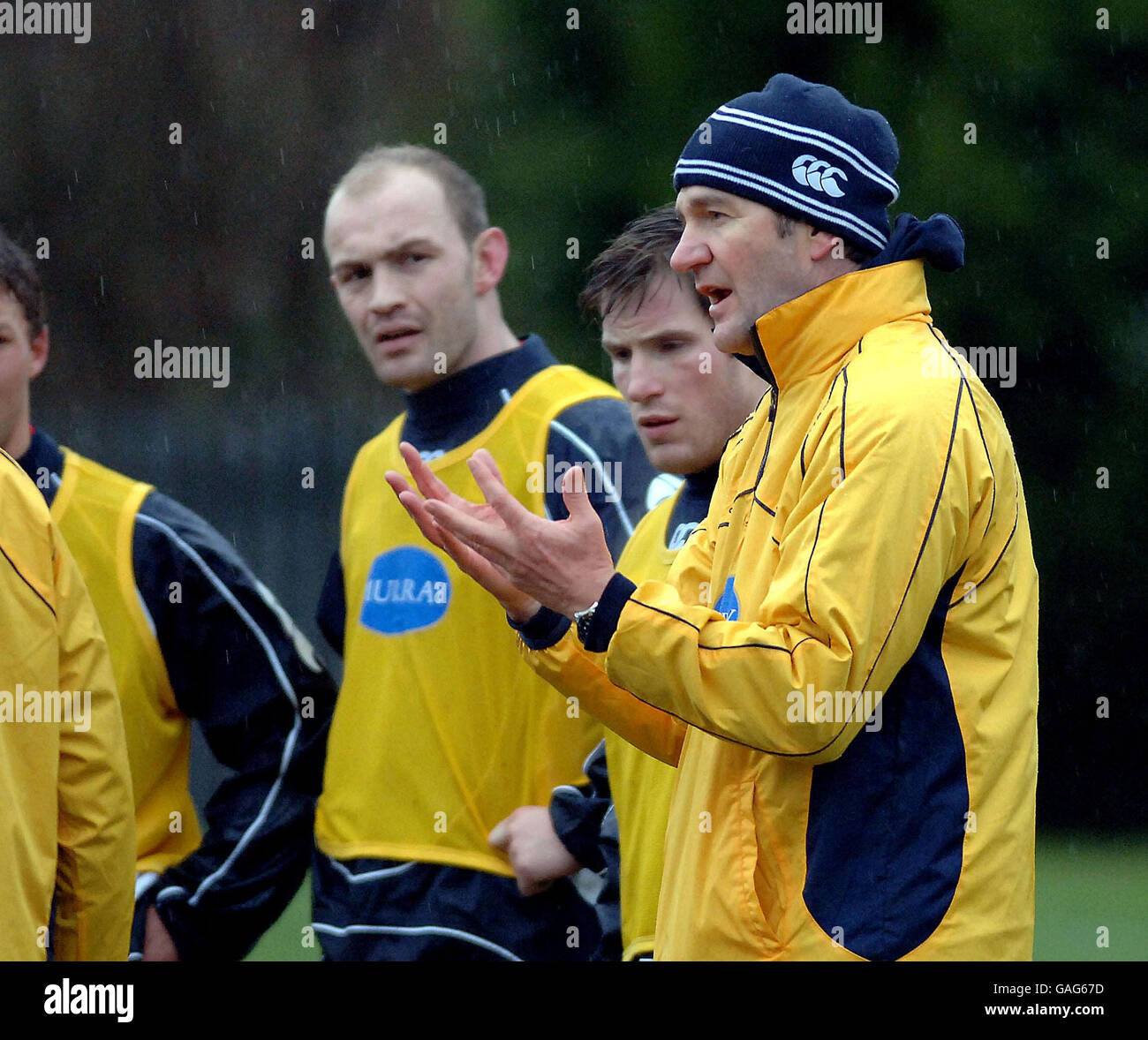 Scotland coach Frank Hadden speaks with his players during a training ...