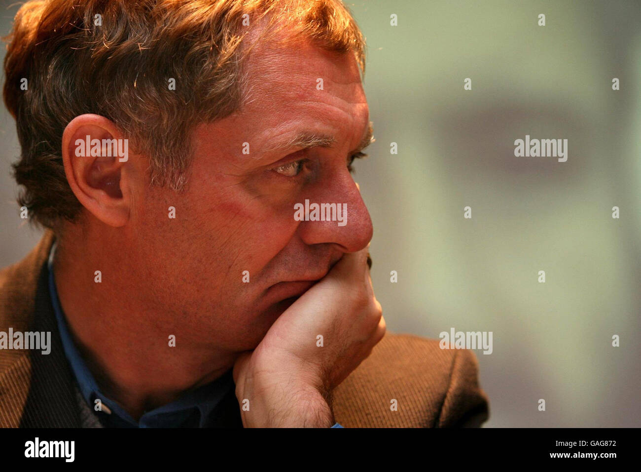 Poet Laureate Andrew Motion looks ahead during the book launch of ...