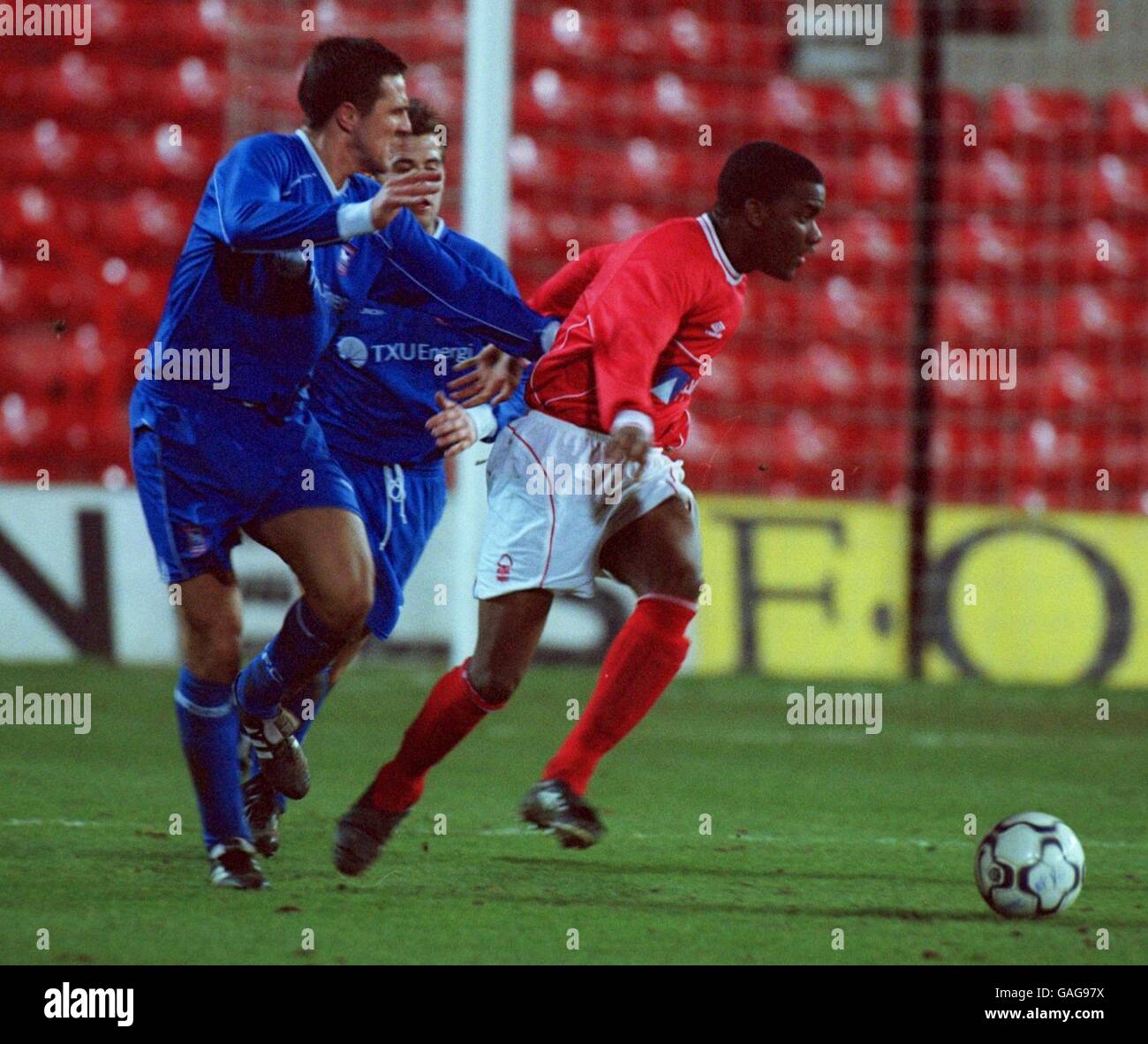Ipswich Town's Gary Croft battles for the ball with Forests Craig ...